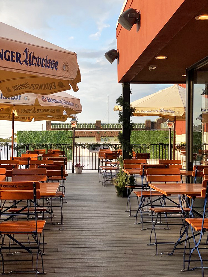 The biergarten beckons with its umbrella-shaded tables and promise of open-air feasting. Even Florida's sunshine seems to have a German accent here.