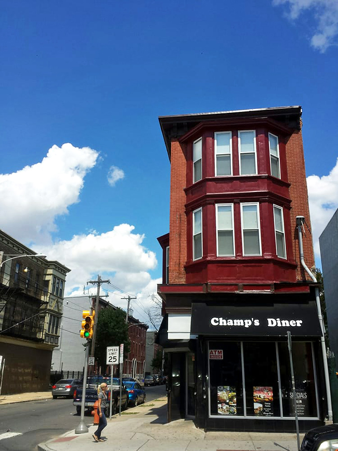 Housed in a classic Philadelphia corner building, Champ's stands as a beacon of breakfast hope against the city skyline, calling hungry patrons like a delicious lighthouse.