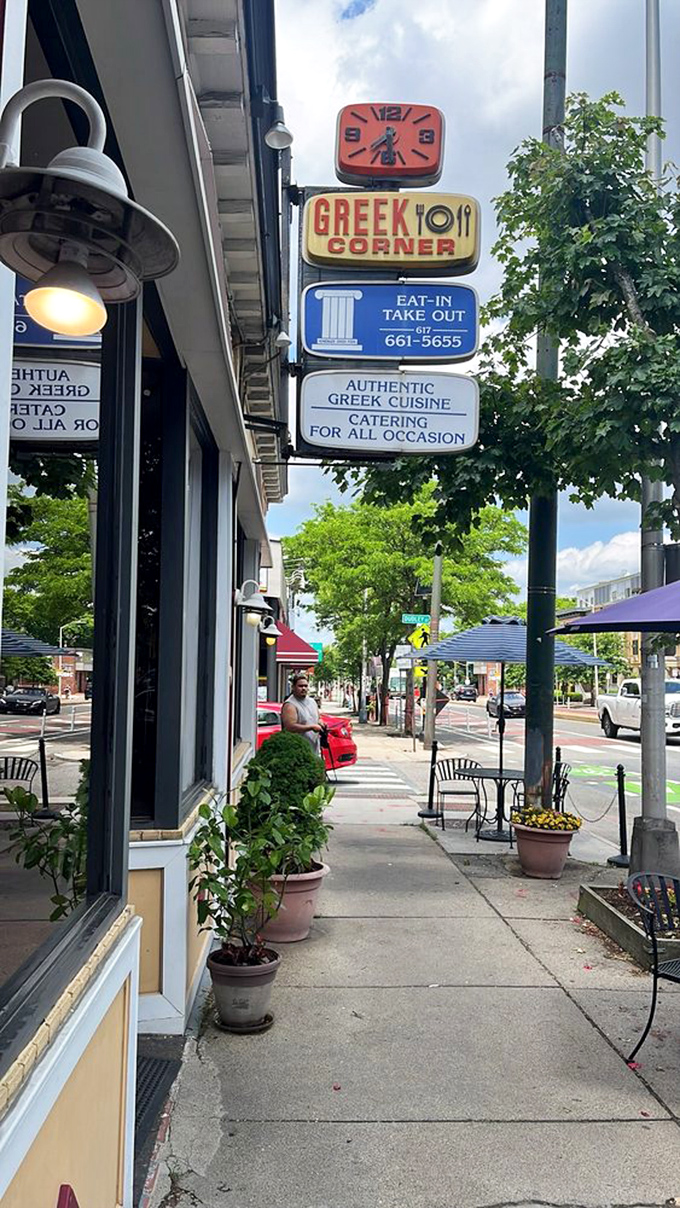 The iconic sign stands tall on Mass Ave, a colorful promise of authentic Greek cuisine that's been keeping its word for decades.