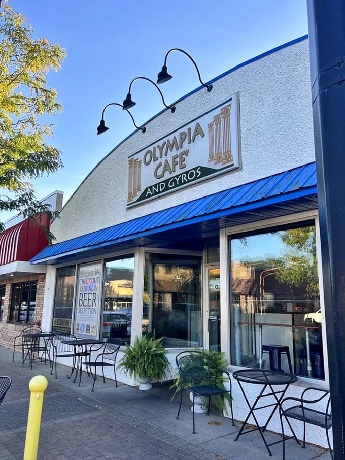 Outdoor seating for those perfect Minnesota days when the weather gods smile upon us. Blue awning, white walls—Greece without the airfare.