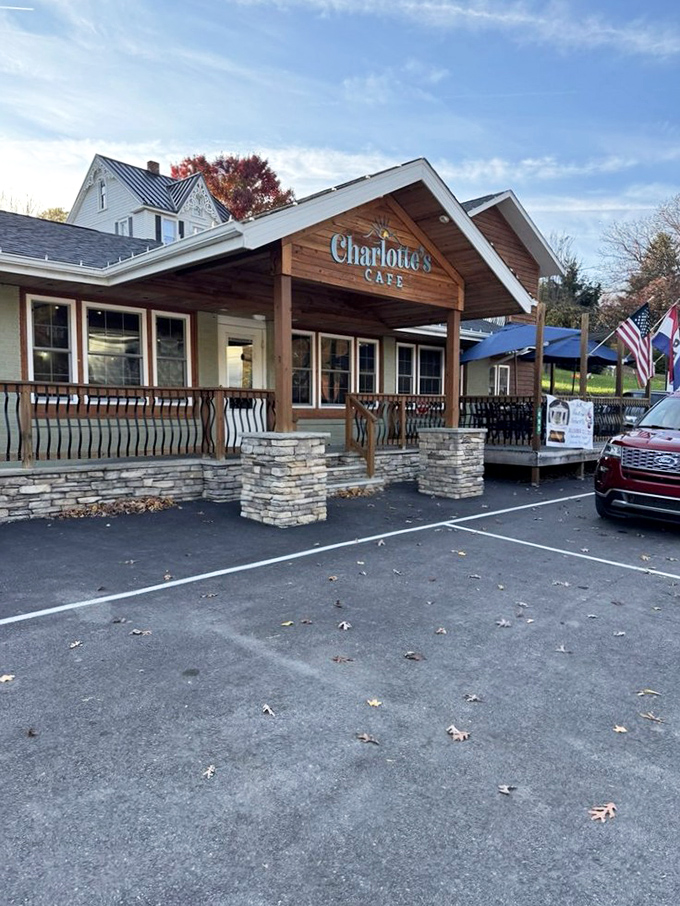 Charlotte's Cafe stands proudly against a blue West Virginia sky, a beacon of breakfast hope in Berkeley Springs.