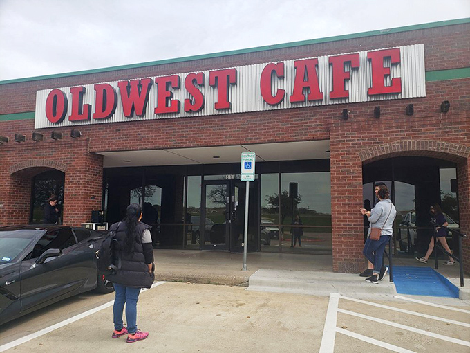 The exterior might be unassuming, but that line of people knows what awaits inside. Breakfast treasures require a bit of patience.