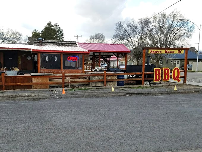 The thumbs-up says it all! When your plate looks like this, silence is golden&mdash;the universal language of barbecue bliss.