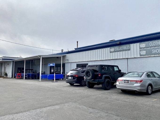 The exterior view reveals the true scale of this discount wonderland. Each parked car represents another shopper's quest for the ultimate deal.