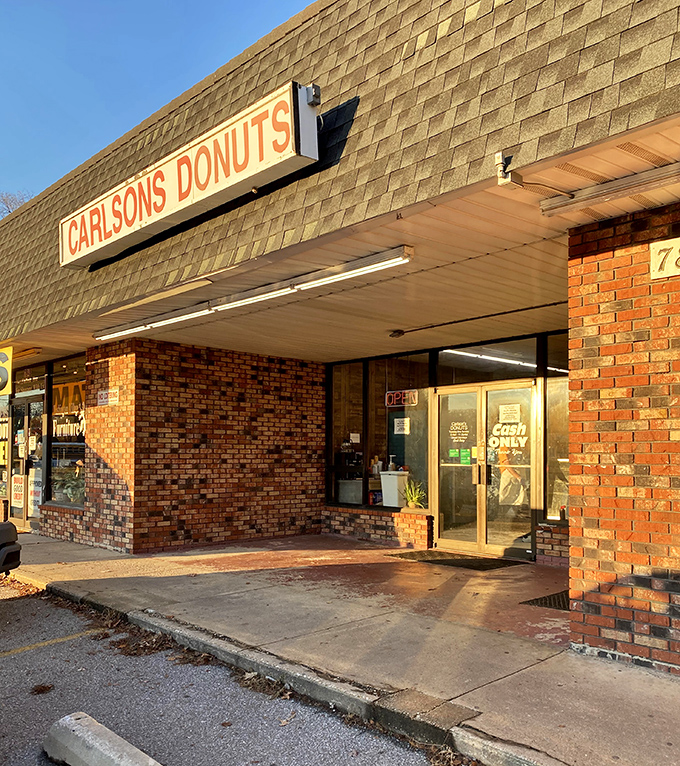 Morning sunlight bathes the brick facade in golden light &ndash; nature's way of highlighting where you should be heading for breakfast.