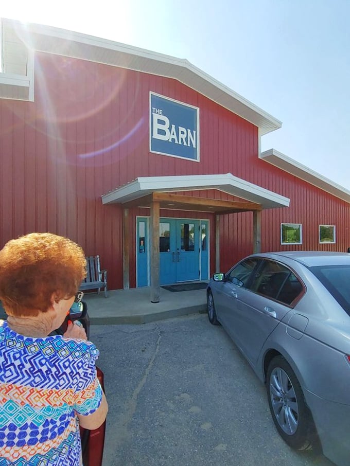 The bright blue doors against the red exterior create a welcoming contrast. That bench out front? It's for catching your breath after consuming what might be the best meal in Harvey County.