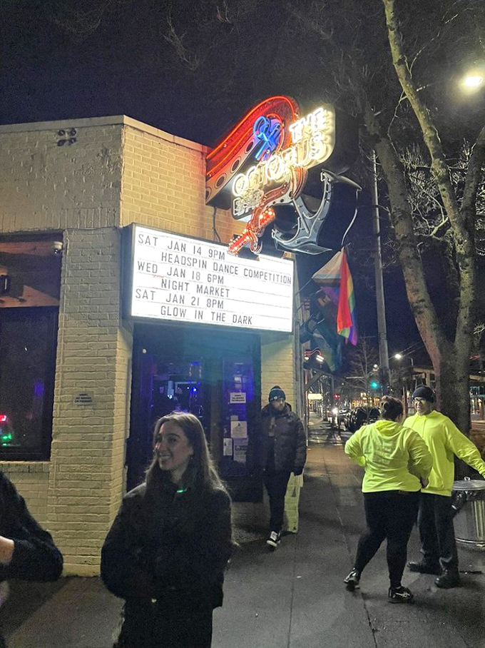 After dark, the neon octopus sign serves as a beacon for night owls seeking shelter, stiff drinks, and the possibility of a headspinning dance competition.