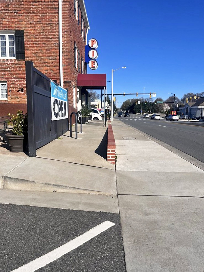 The vintage "PIE" sign beckons like a lighthouse guiding hungry souls to safe harbor. Some signs in life are worth following without question.