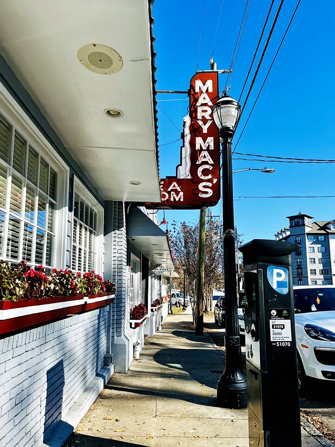 That vertical neon sign isn't just advertising—it's an Atlanta landmark promising that some things in this world remain wonderfully constant.