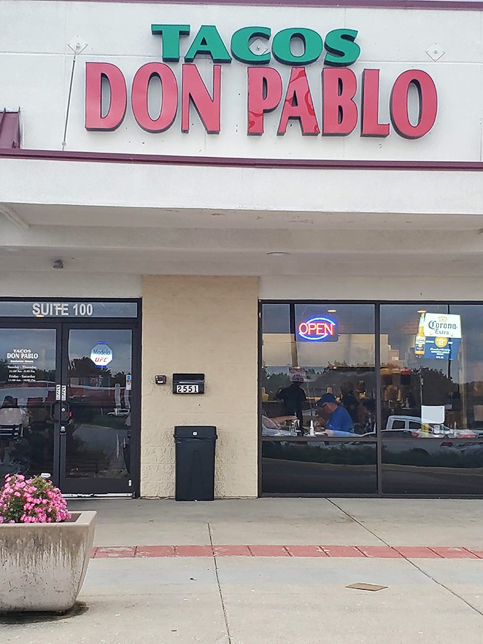 The modest storefront belies the flavor explosion waiting inside. Like finding out your quiet neighbor used to tour with The Rolling Stones.