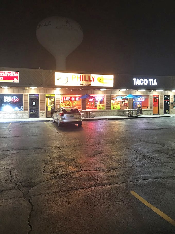 After dark, the neon glow beckons hungry night owls. Like a lighthouse for those navigating the treacherous waters of hunger.