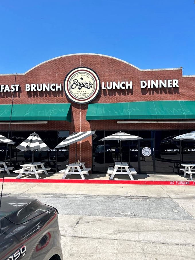 Under clear Texas skies, the Bay34th Street Diner stands ready to transform ordinary mornings into extraordinary memories. Those striped umbrellas aren't just for show.