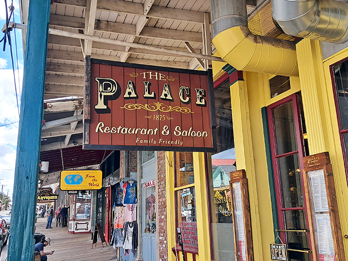 The Palace Restaurant & Saloon has been serving hungry miners and tourists since 1875, its wooden sign a beacon for those seeking sustenance and spirits.