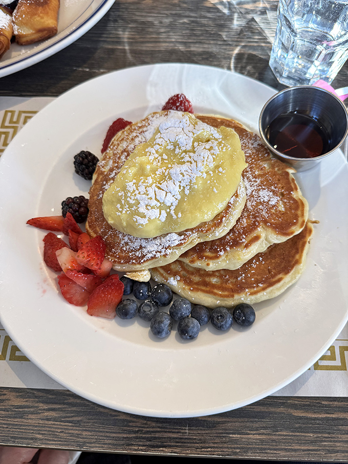 Pancakes that achieve the impossible: substantial enough to satisfy, yet light enough to make you forget you're eating carbs before noon.