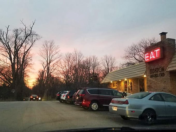 As dusk settles over La Porte, that glowing "EAT" sign becomes a beacon for hungry souls seeking the comfort only a true supper club can provide.