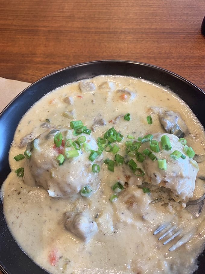 Not your grandmother's biscuits and gravy&mdash;unless your grandmother was secretly a five-star chef. Those green onions aren't just garnish; they're exclamation points.