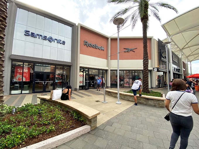 Samsonite and Reebok: solving both your vacation packing and vacation fitness aspirations in one convenient corner. That's what I call efficient shopping.