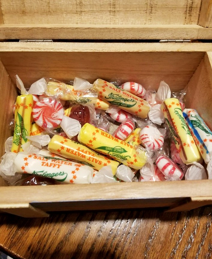 The meal's sweet finale&mdash;saltwater taffy treasures nestled in their wooden chest, waiting to extend your coastal fantasy just a little longer.