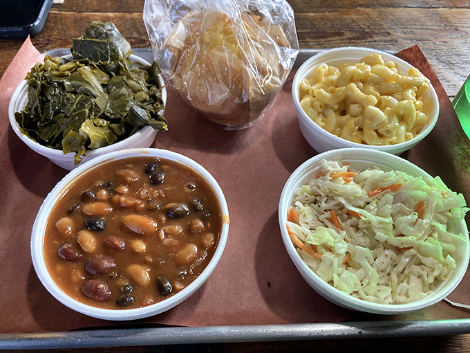 The supporting cast of sides&mdash;mac and cheese, beans, greens, and slaw&mdash;plays their essential role in the barbecue symphony with humble excellence.