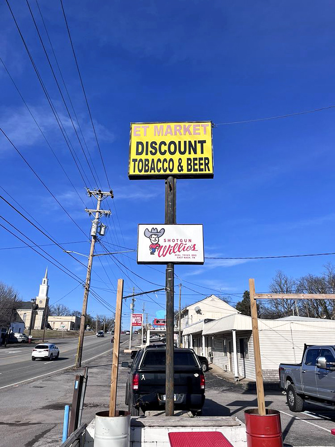Even the roadside sign knows its role&mdash;guiding hungry travelers to barbecue salvation like a smoky North Star.