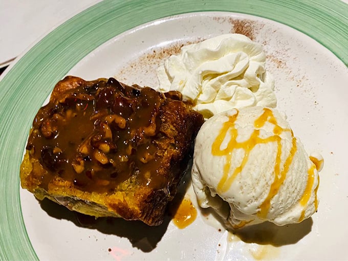 This sticky bun bread pudding isn't dessert; it's therapy with caramel sauce. That scoop of vanilla ice cream is melting with anticipation of meeting its sweet, warm companion.