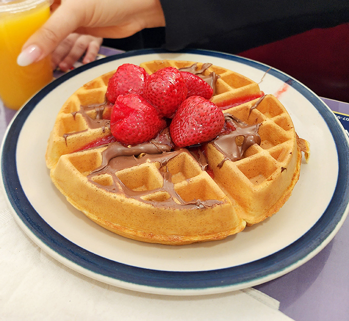 Eggs Benedict's fancy cousin has arrived&mdash;hollandaise-draped perfection with those home fries playing the essential supporting role. A breakfast worthy of your stretchy pants. 