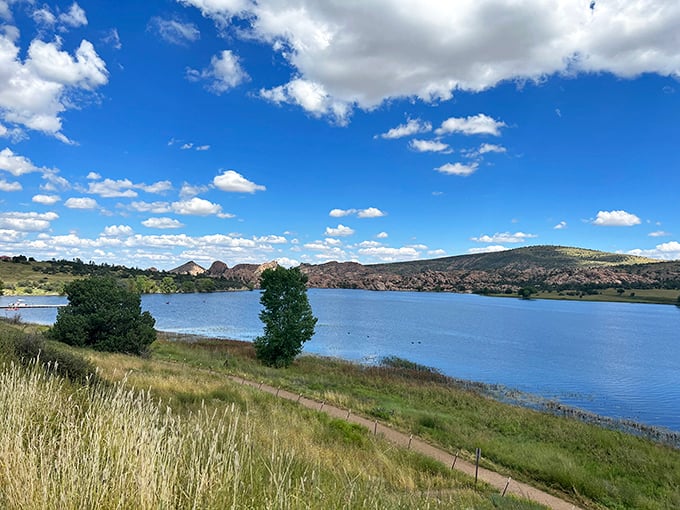 Watson Lake's expansive waters reflect Prescott's big sky country. Where outdoor enthusiasts find paradise and budget-conscious retirees discover their Social Security checks stretch like the horizon.