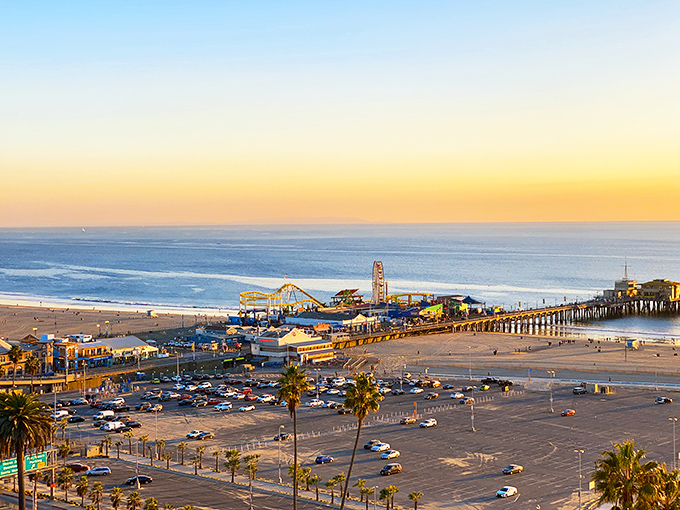 From above, the Santa Monica Pier reveals its true magic&mdash;a colorful playground where the edge of America meets endless ocean, bathed in that golden California sunset glow.