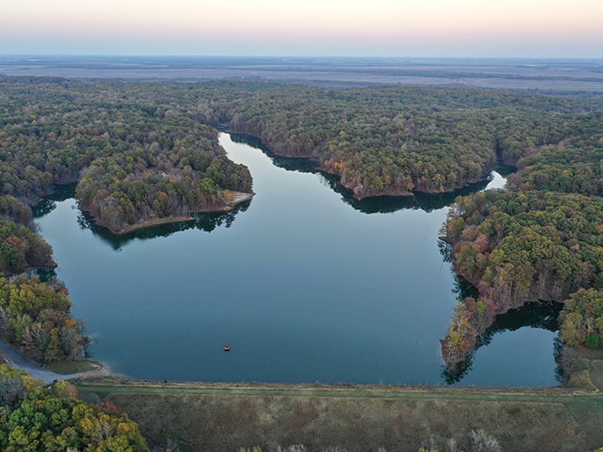 From above, the lake reveals its true personality &ndash; a blue oasis cradled by forest, shaped like nature's own Rorschach test.