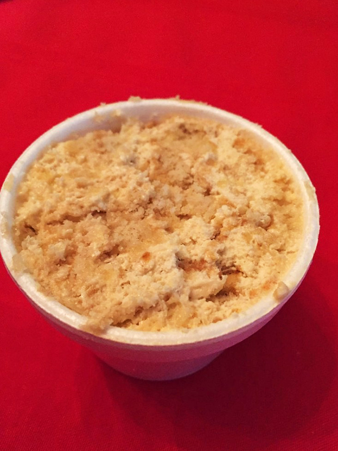This banana pudding isn't trying to be fancy; it's too busy being exactly what comfort tastes like after a parade of smoky perfection.