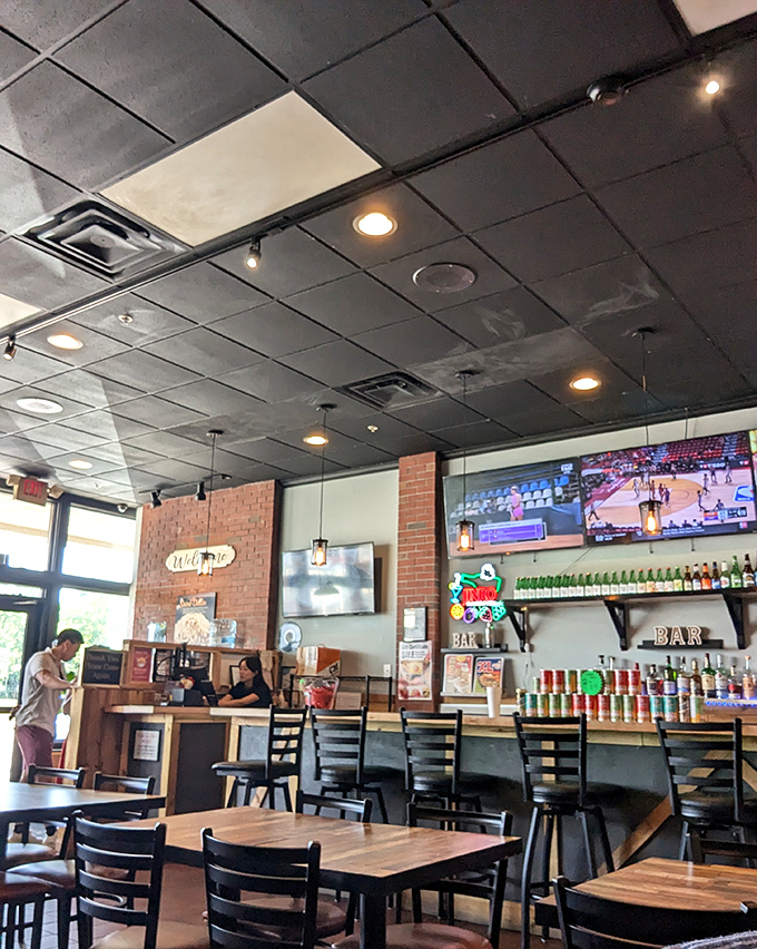 The bar area &ndash; because nothing complements crispy, spicy chicken like a cold beverage. Beer and fried chicken: proving that soulmates exist in food form.