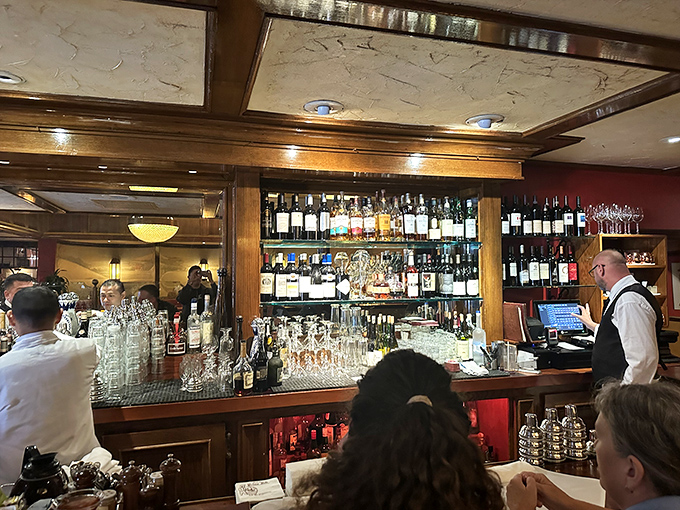 The bar at House of Prime Rib &ndash; where classic cocktails are crafted with the same reverence as the legendary beef that brings everyone here.