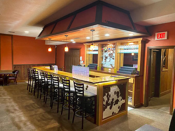 The tavern's bar stands ready to serve modern patrons in a space where trail-weary travelers once sought refreshment, proving that some traditions improve beautifully with age.