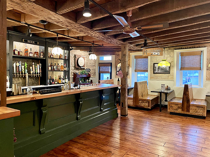 The bar area combines colonial charm with modern libations—where George Washington might have enjoyed a craft beer if he'd had the chance.