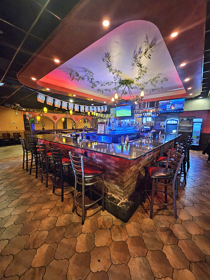 The bar at Fiesta Maya doesn't just serve drinks&mdash;it creates community under the gentle glow of colorful lights. This is where stories get told and weekdays get redeemed.