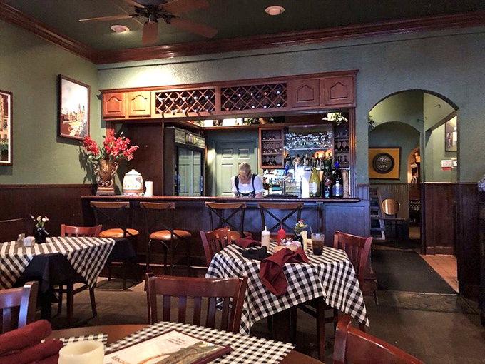 The bar area feels like a secret corner of Munich transported to Alabama. Those checkered tablecloths aren't just decoration&mdash;they're an invitation to linger over schnapps.