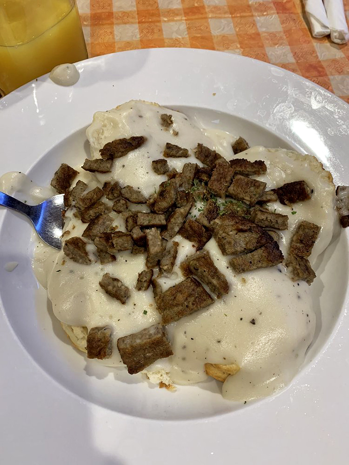Biscuits buried under a landslide of sausage gravy&mdash;archaeology never tasted so good or required so many napkins.
