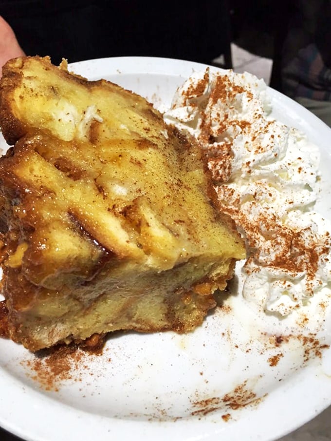 Bread pudding that makes you close your eyes with each bite&mdash;cinnamon-spiced comfort topped with a cloud of whipped cream.
