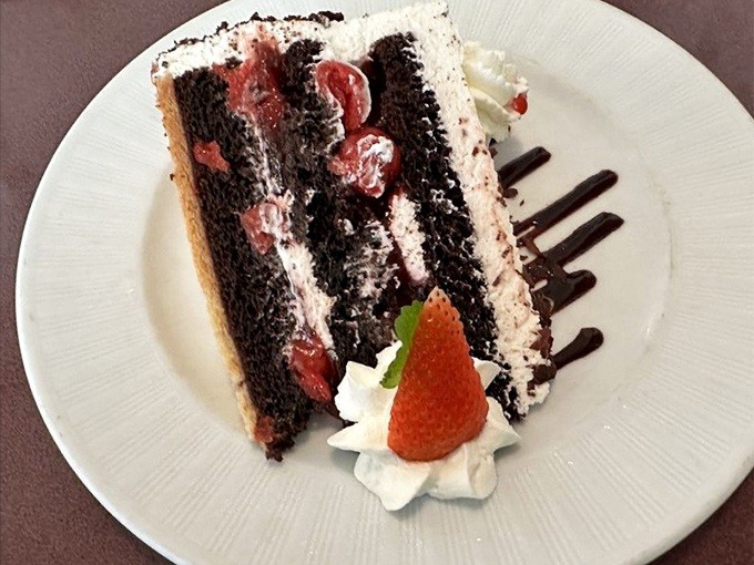 Black Forest cake that transports you straight to the German countryside. Those layers aren't just cake—they're edible nostalgia.