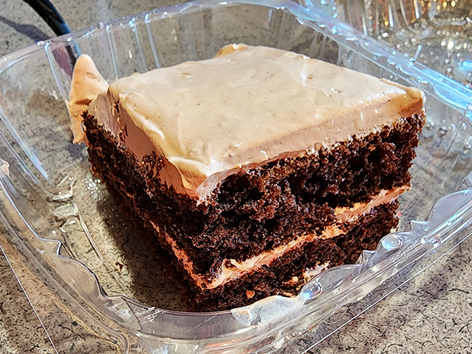 Chocolate cake that looks like it could solve most of life's problems &ndash; dense, moist layers with frosting that's asking to be scraped off with your fork first.