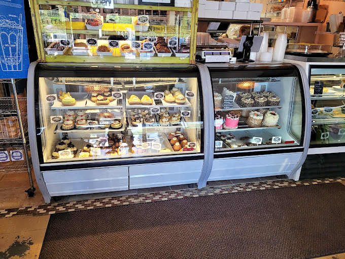 The bakery case&mdash;where willpower goes to die. Each pastry sits like a little edible jewel, patiently waiting to ruin your diet plans.