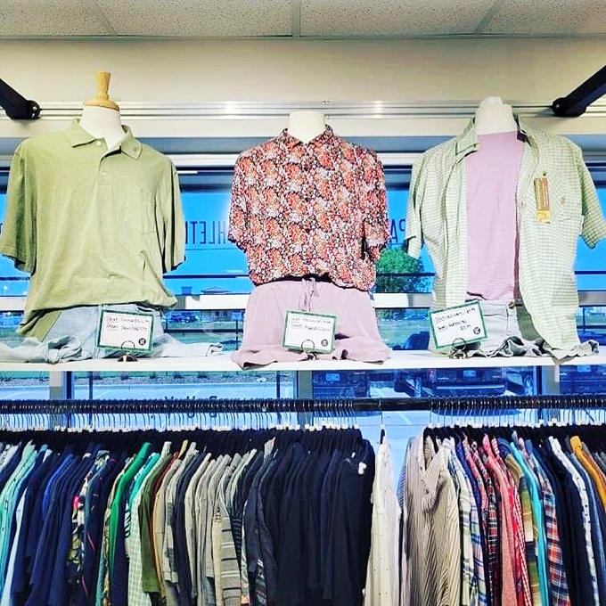 The men's display showcases how a few quality pieces can transform a wardrobe from "laundry day emergency" to "purposeful adult who has their life together."