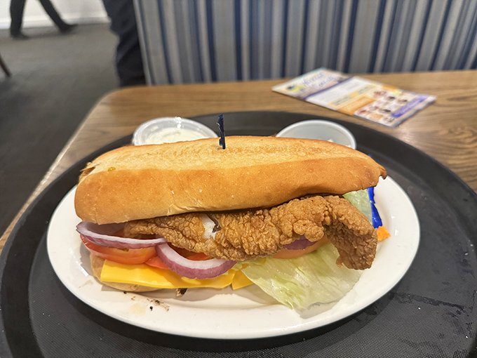 This sandwich doesn't just satisfy hunger &ndash; it conquers it. Crispy fried fish and fresh toppings create the perfect handheld meal.