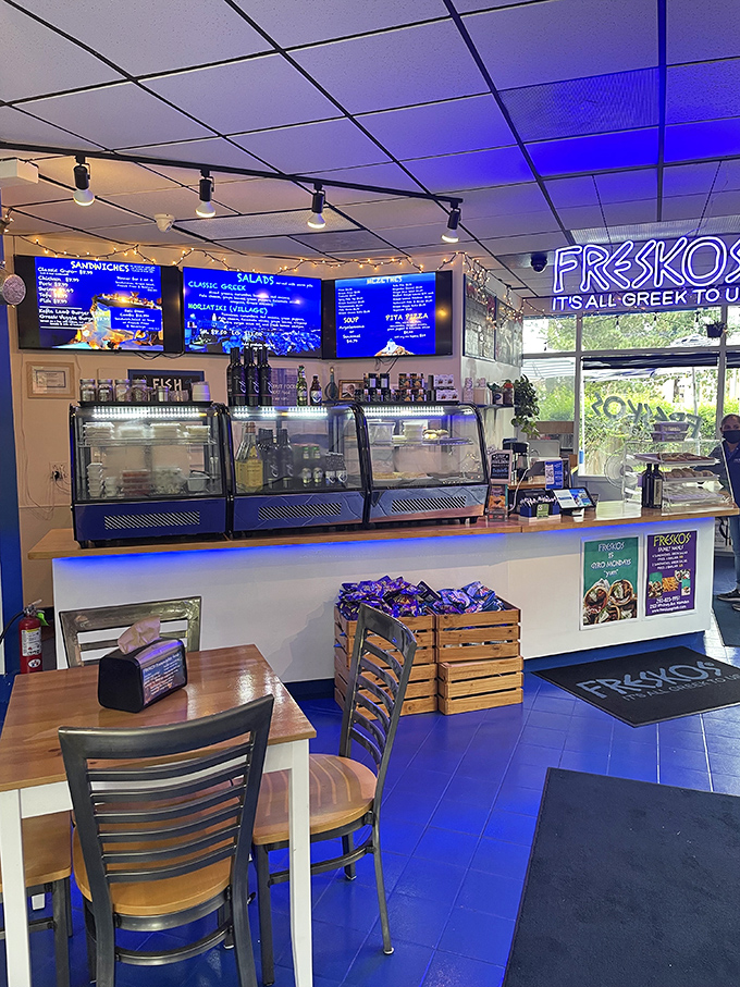 The counter where dreams come true, bathed in that signature Freskos blue light. Like the command center of a delicious Greek mothership.