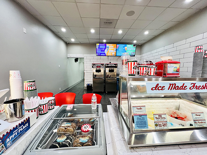 Behind the counter where the magic happens. Those machines aren't just appliances; they're happiness generators working overtime.