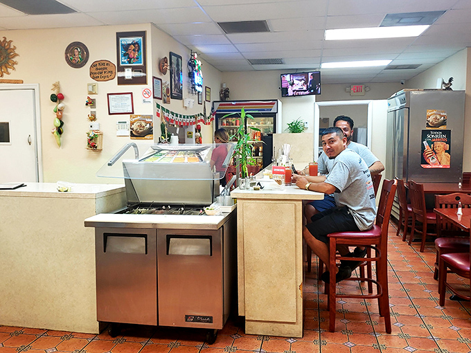 The counter seating offers front-row tickets to the culinary show, where everyday magic happens without fancy equipment or pretentious techniques.