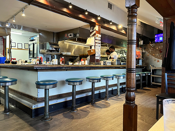 Counter seating: where breakfast theater happens in real time. Watch the short-order ballet as cooks transform simple ingredients into plates of morning magic.