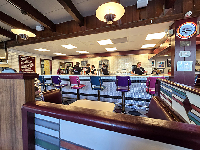 The counter seating offers front-row tickets to the culinary show, where burgers sizzle and milkshakes whirl in a delicious daily performance.