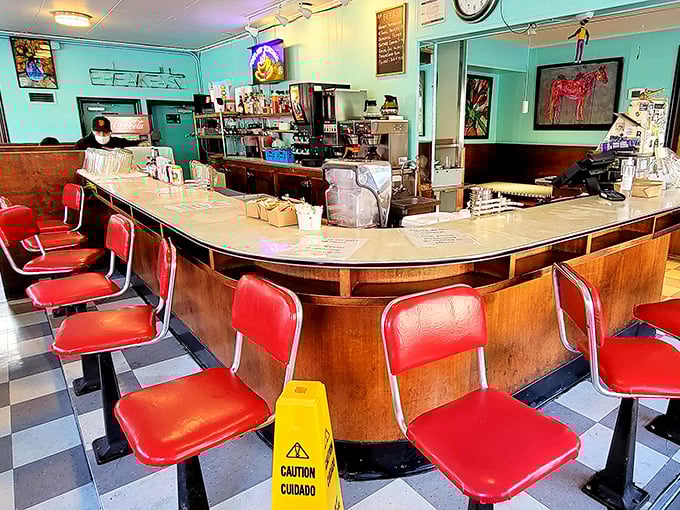 The counter where breakfast dreams come true. Those red stools have witnessed countless first bites of life-changing French toast and knowing nods of approval.