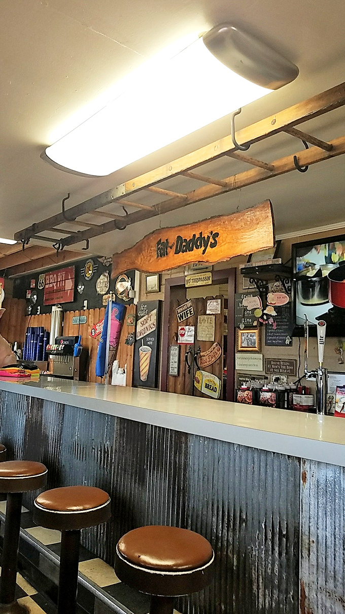 The counter seating puts you front row for the barbecue theater, surrounded by memorabilia and magic.